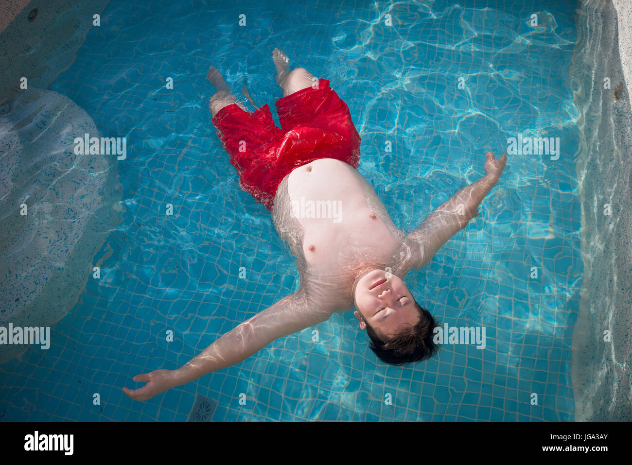 summer vacation holiday and rest free time. man relaxing calming float ...