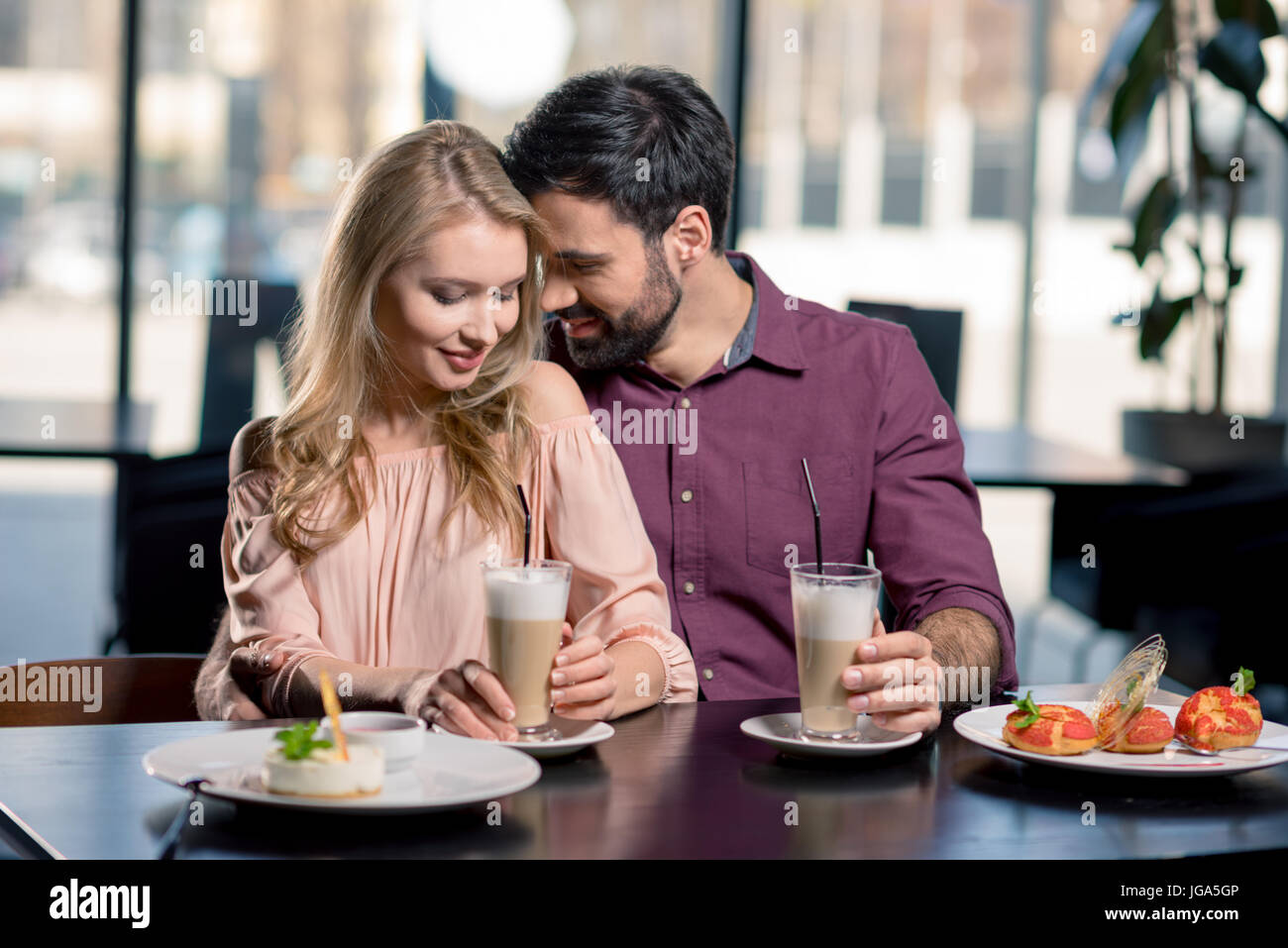 romantic couple in love spending time together on coffee break in ...