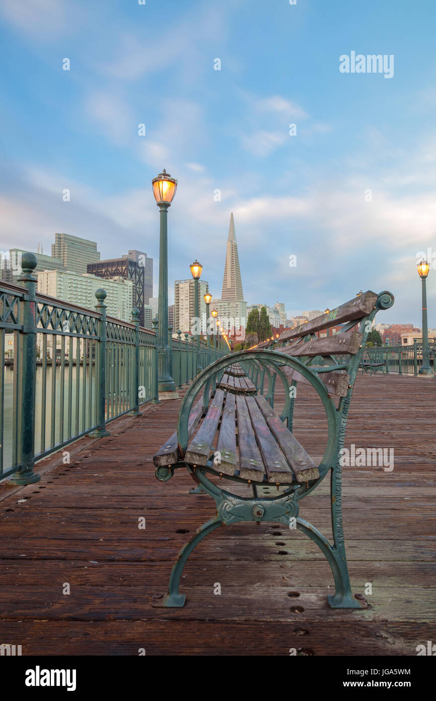 View of the downtown San Francisco through the benches at the pier on a ...