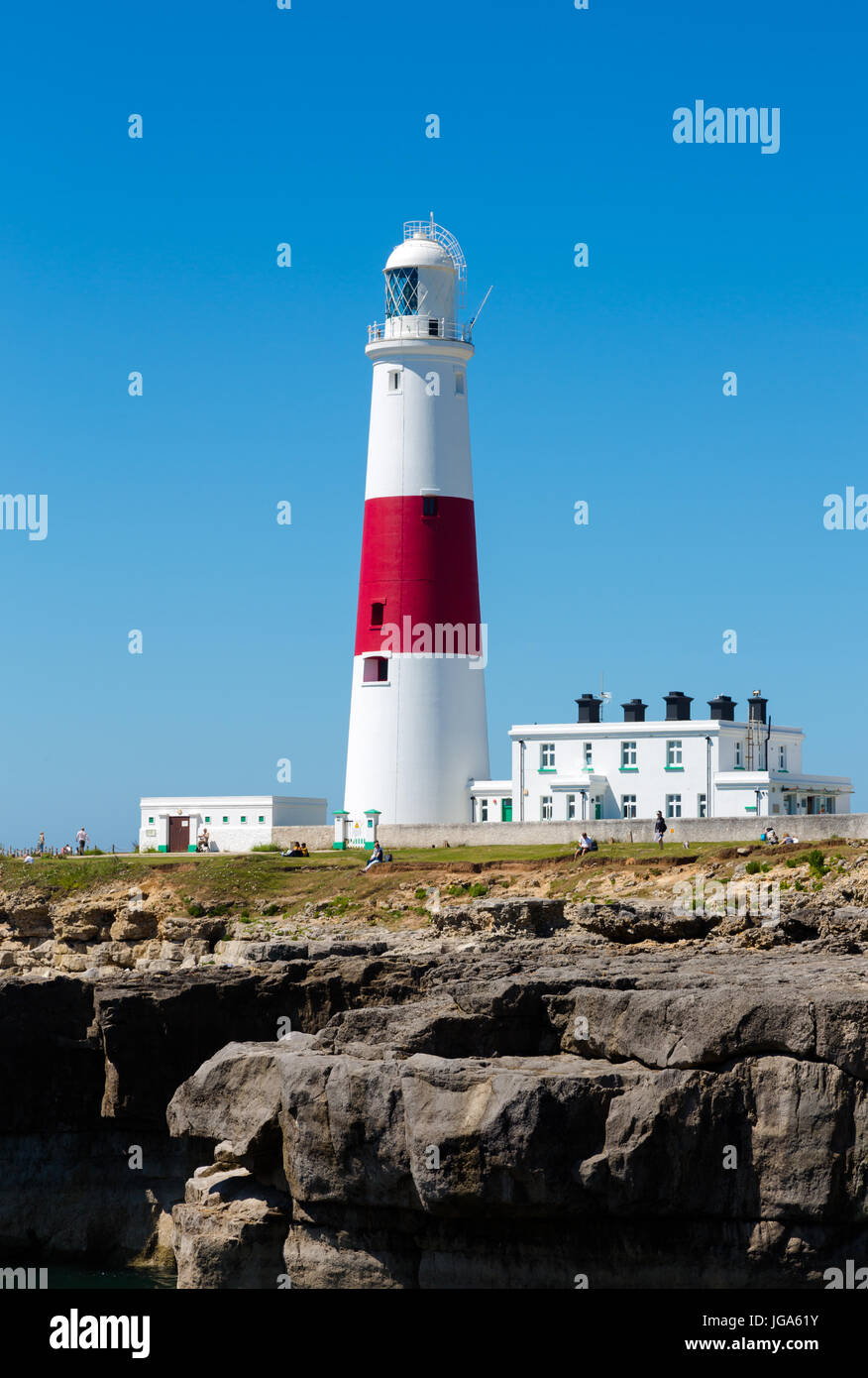 Portland Bill Lighthouse on Portland rocks in sunny summer day with ...