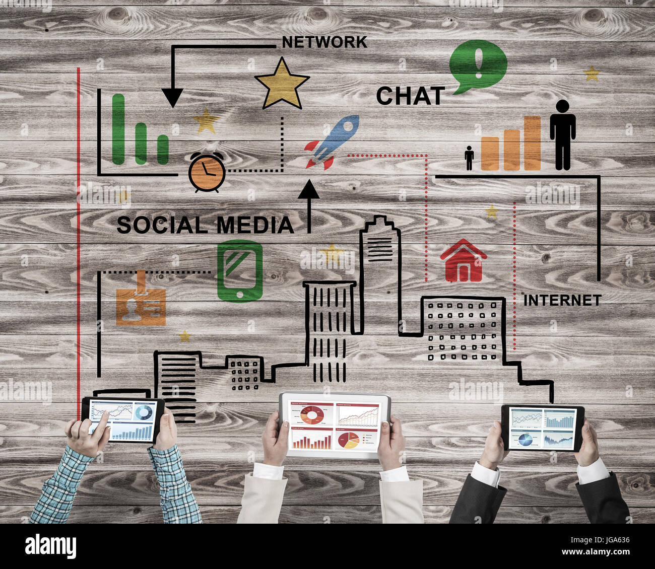 Group of three people with devices in hands working together as symbol ...