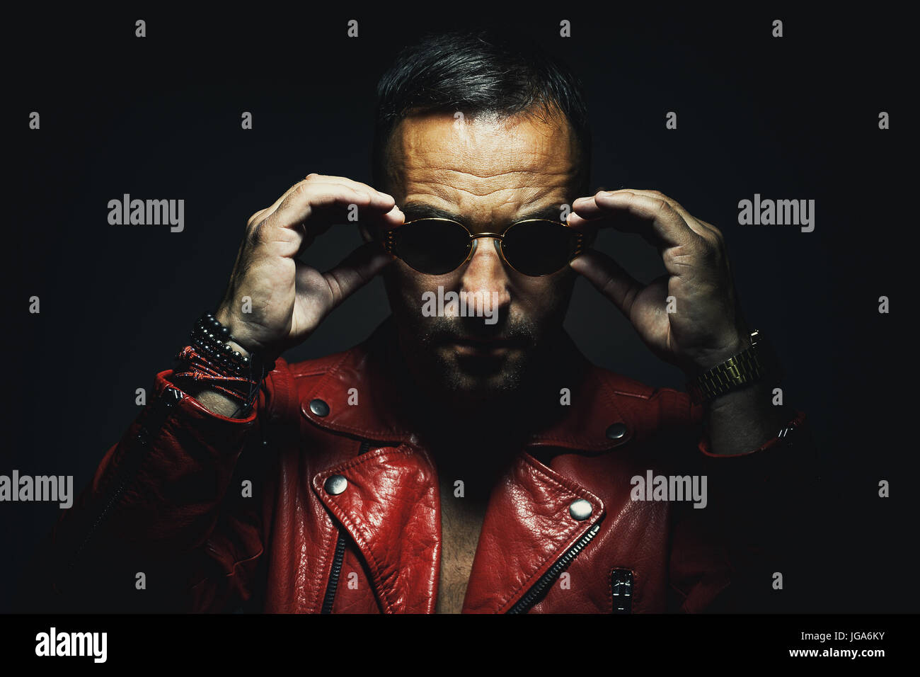 Person in red jacket hi-res stock photography and images - Alamy