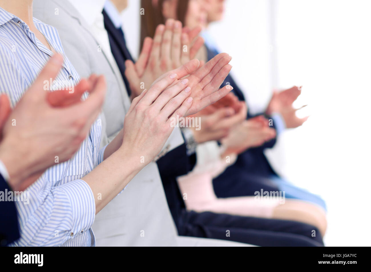 Close up of business people hands clapping at conference Stock Photo ...