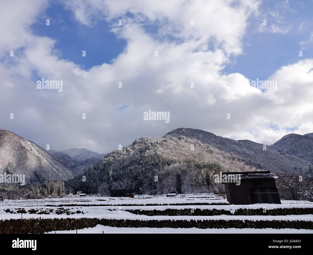 Mountain scenery with a wooden house at the winter in Gifu, Japan Stock ...