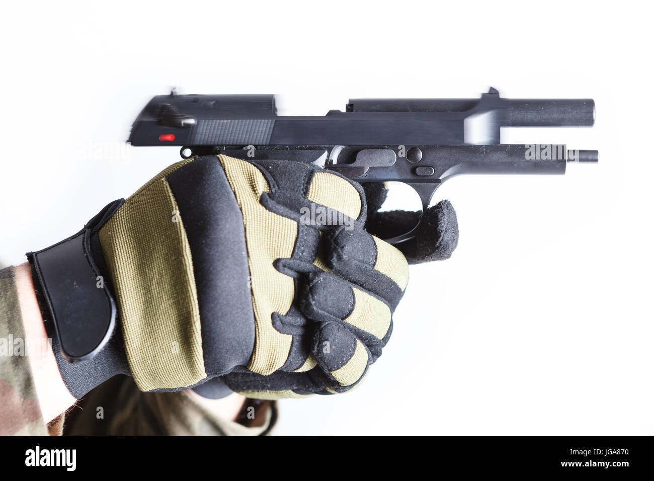 Gloved hands holding a gun on white background Stock Photo - Alamy