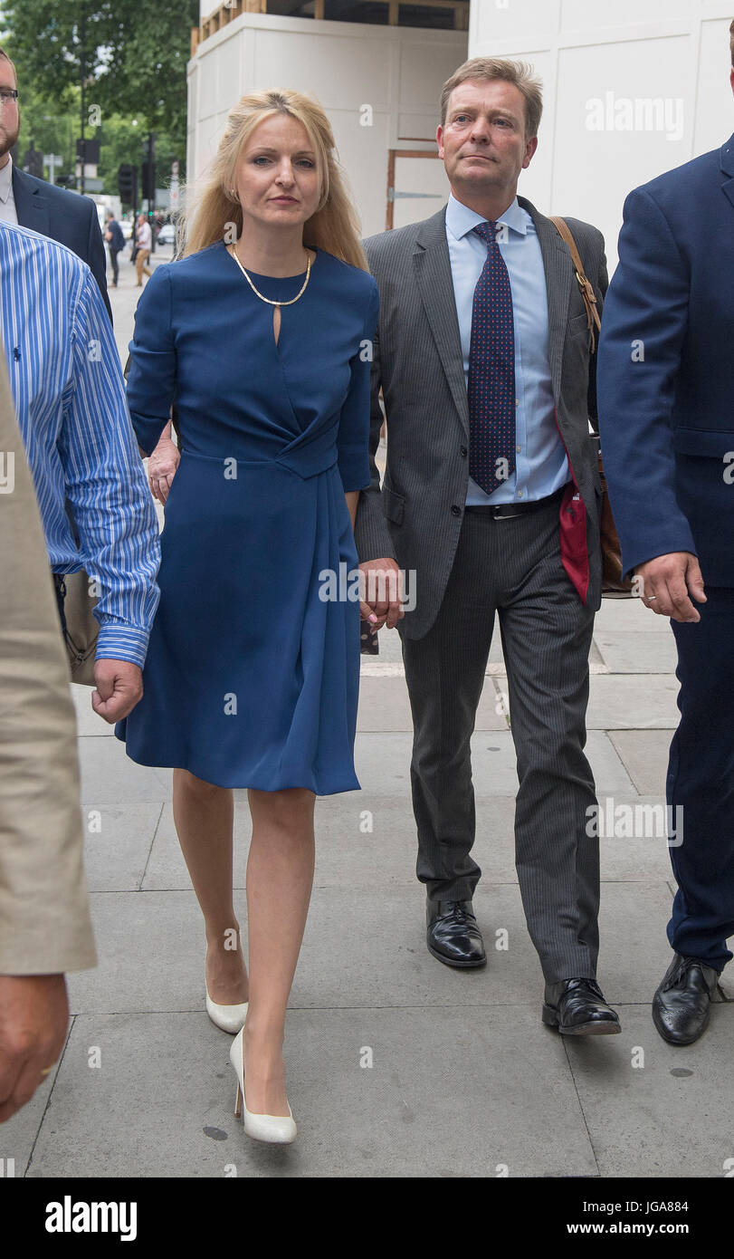 Conservative MP Craig Mackinlay, with his wife Kati Mackinlay, leave ...