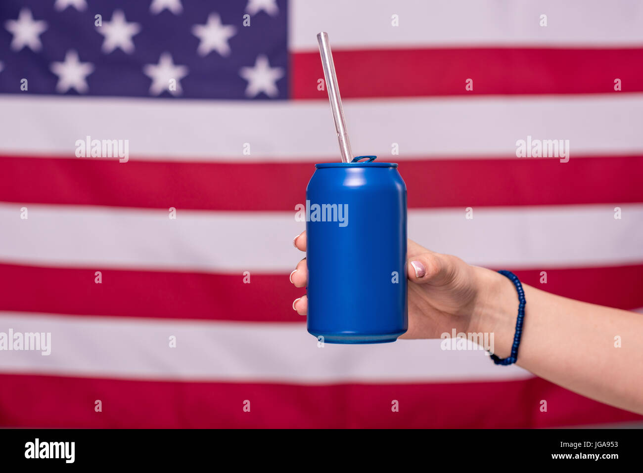 Hand holding can hi-res stock photography and images - Alamy