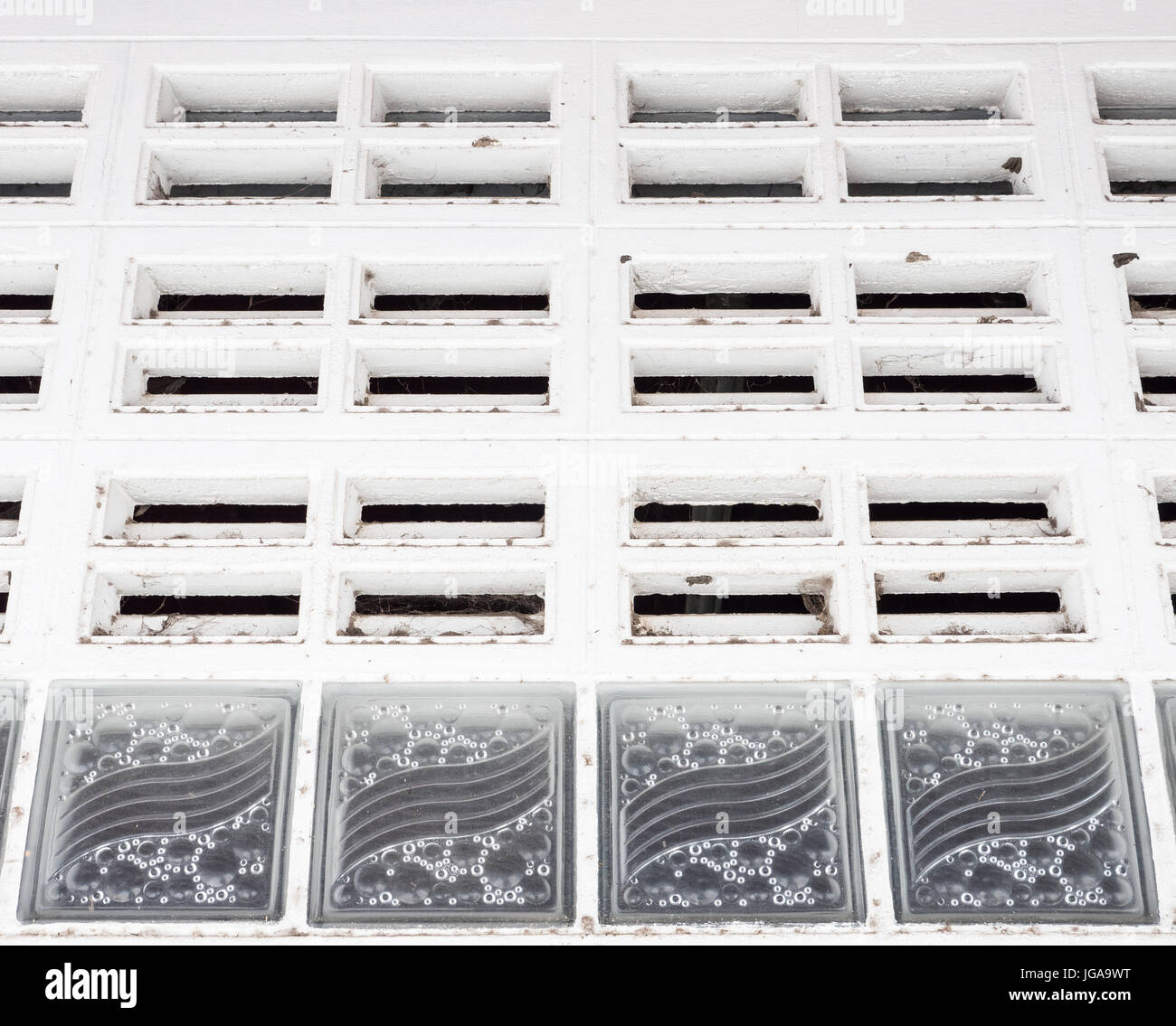 Air ventilation grille with the glass box on the white wall of the ...