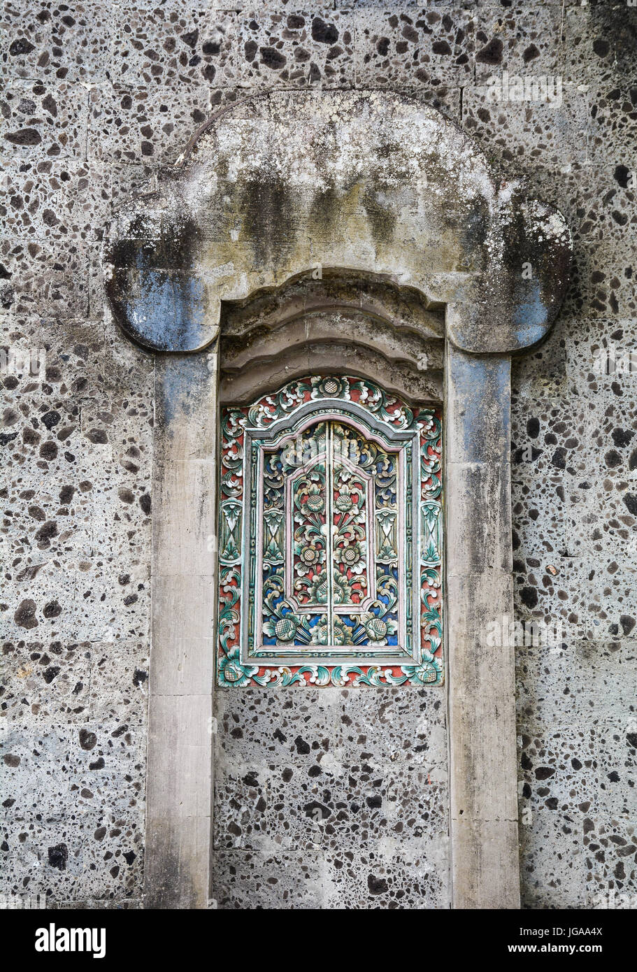 Decoration of ancient wall at the Hindu temple in Bali island ...