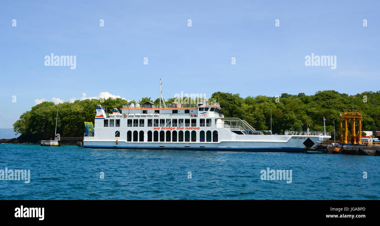 Lombok, Indonesia - Apr 18, 2016. A ferry docking at the tourist jetty ...