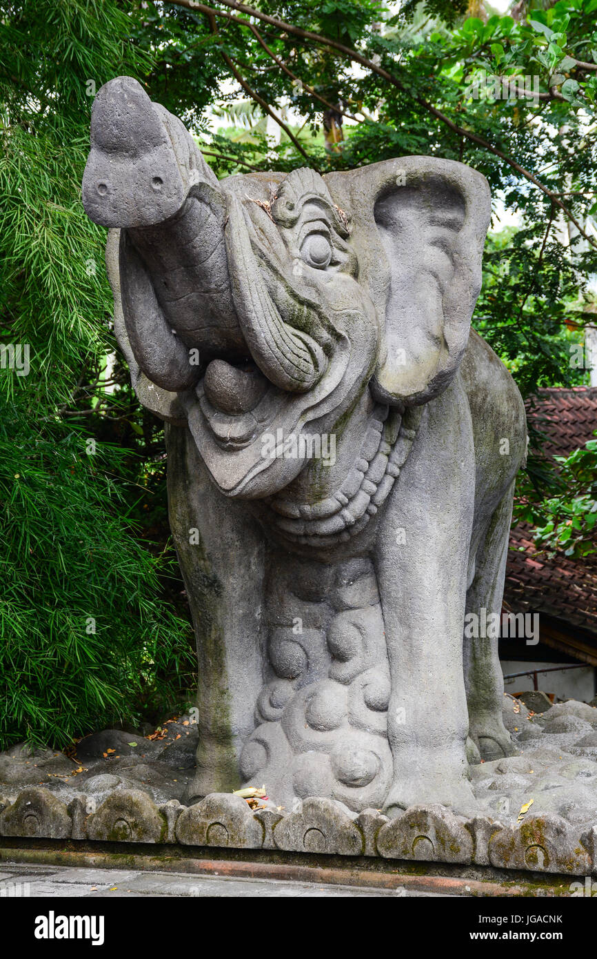 A elephant statue at Elephant Cave Temple in Bali, Indonesia. Goa Gajah ...