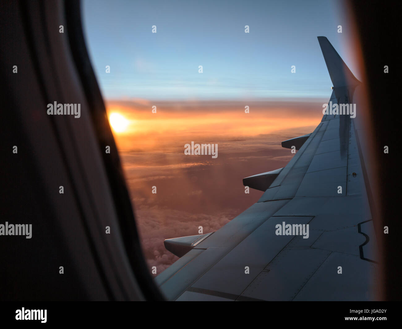 Looking Outside a Window of an Aircraft Cabin: White Airplane Wing and ...
