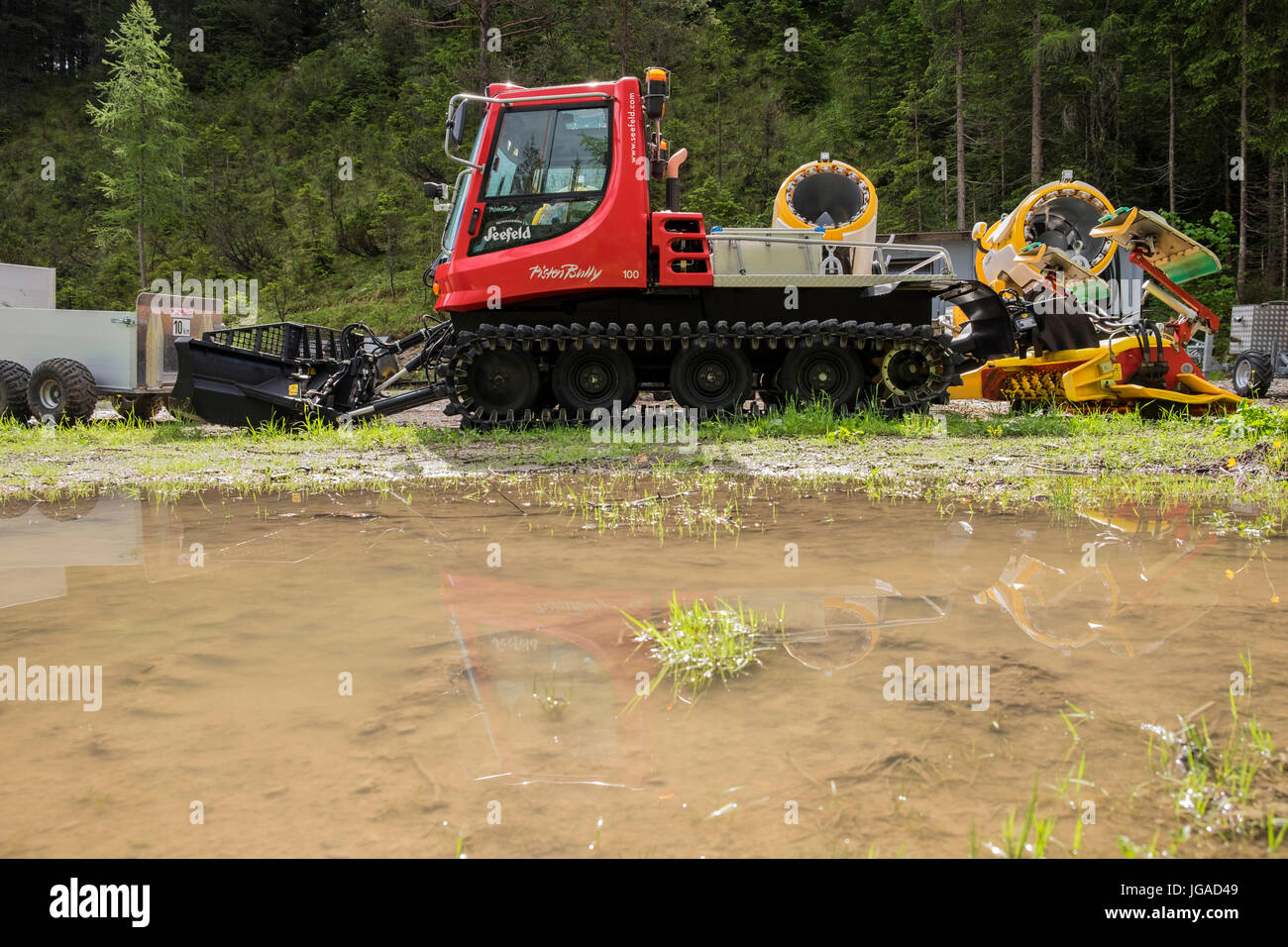 Tracked snowmobile Pisten Billy parked up for the summer in Weidach ...
