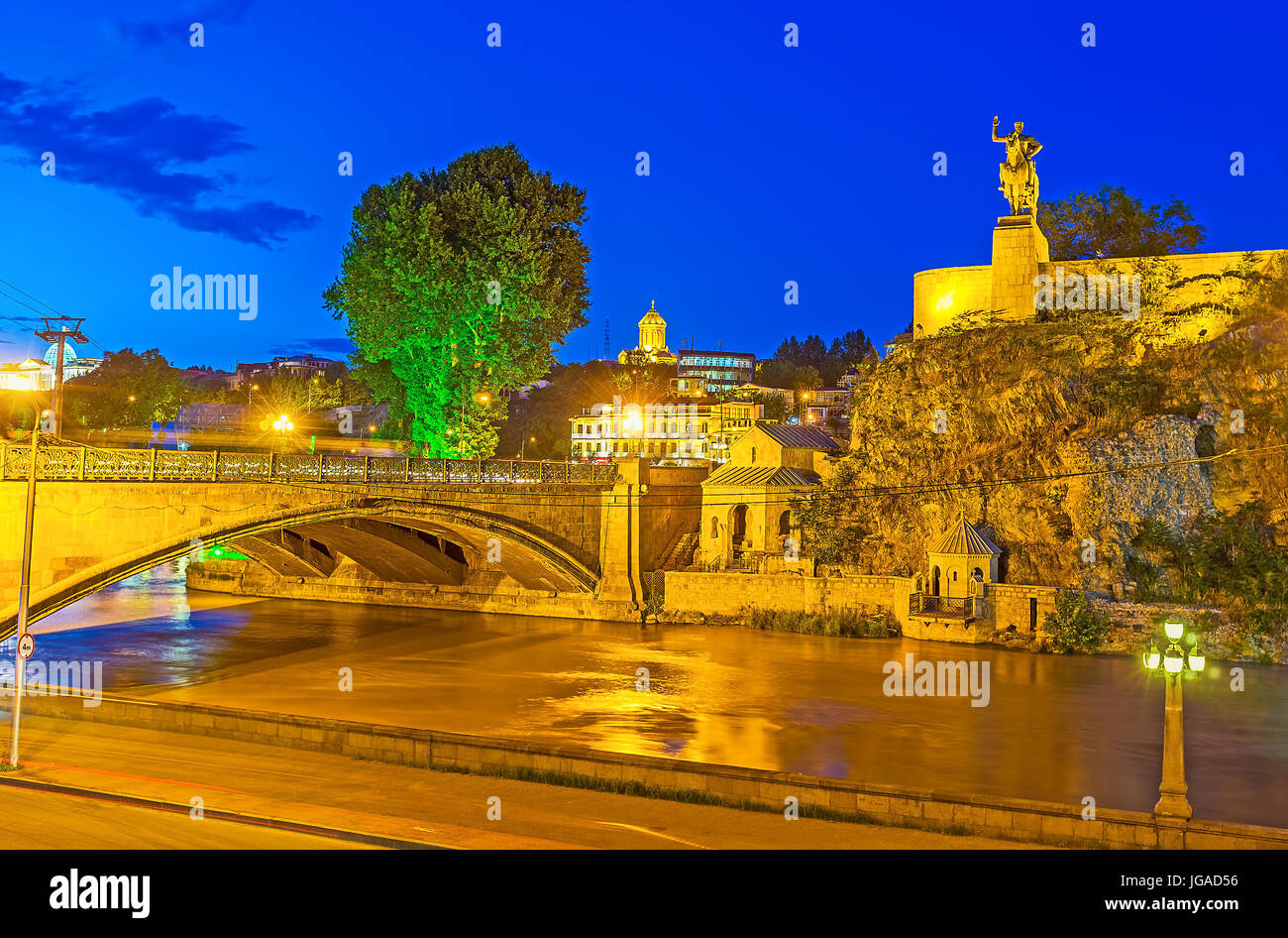 The view on Metekhi bridge over Kura river and equestrian statue of ...