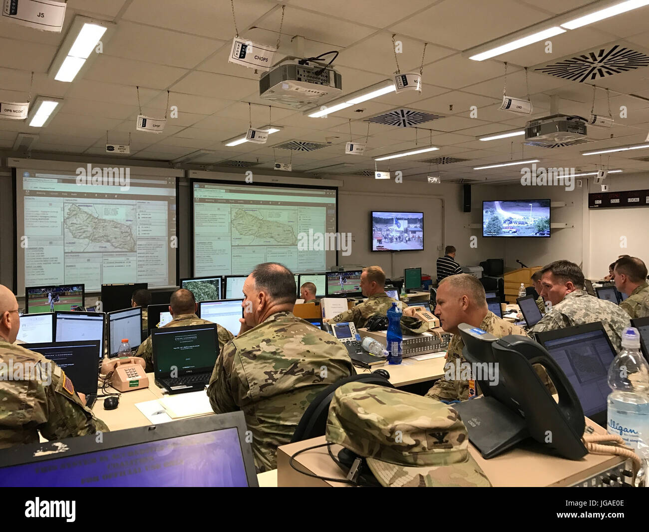 Soldiers from the Cal Guard's 115th Regional Support Group monitor the ...