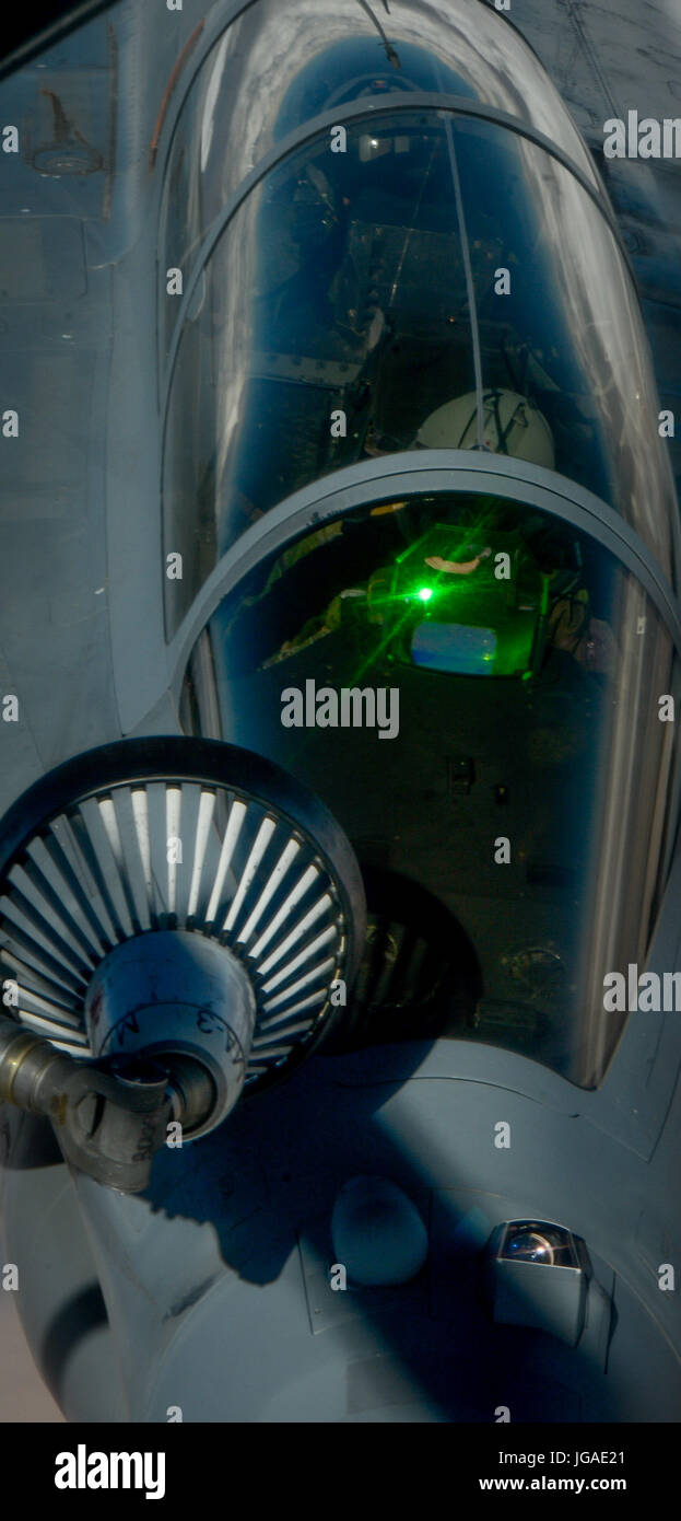A French Air Force Rafale receives in-flight refueling from a U.S. KC ...