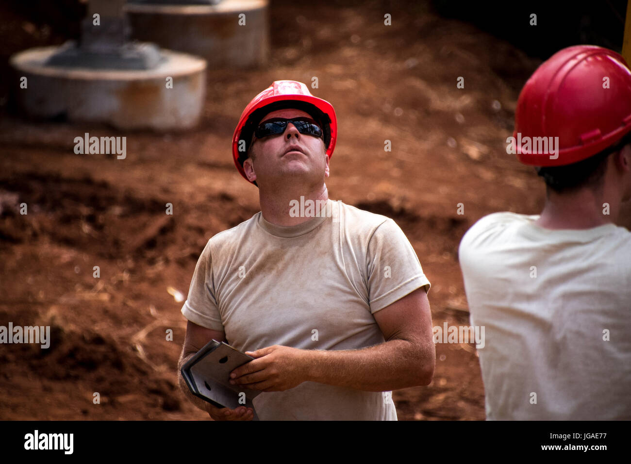 Master Sgt. Jason Benson from the 200th RED HORSE Squadron (RHS) looks ...