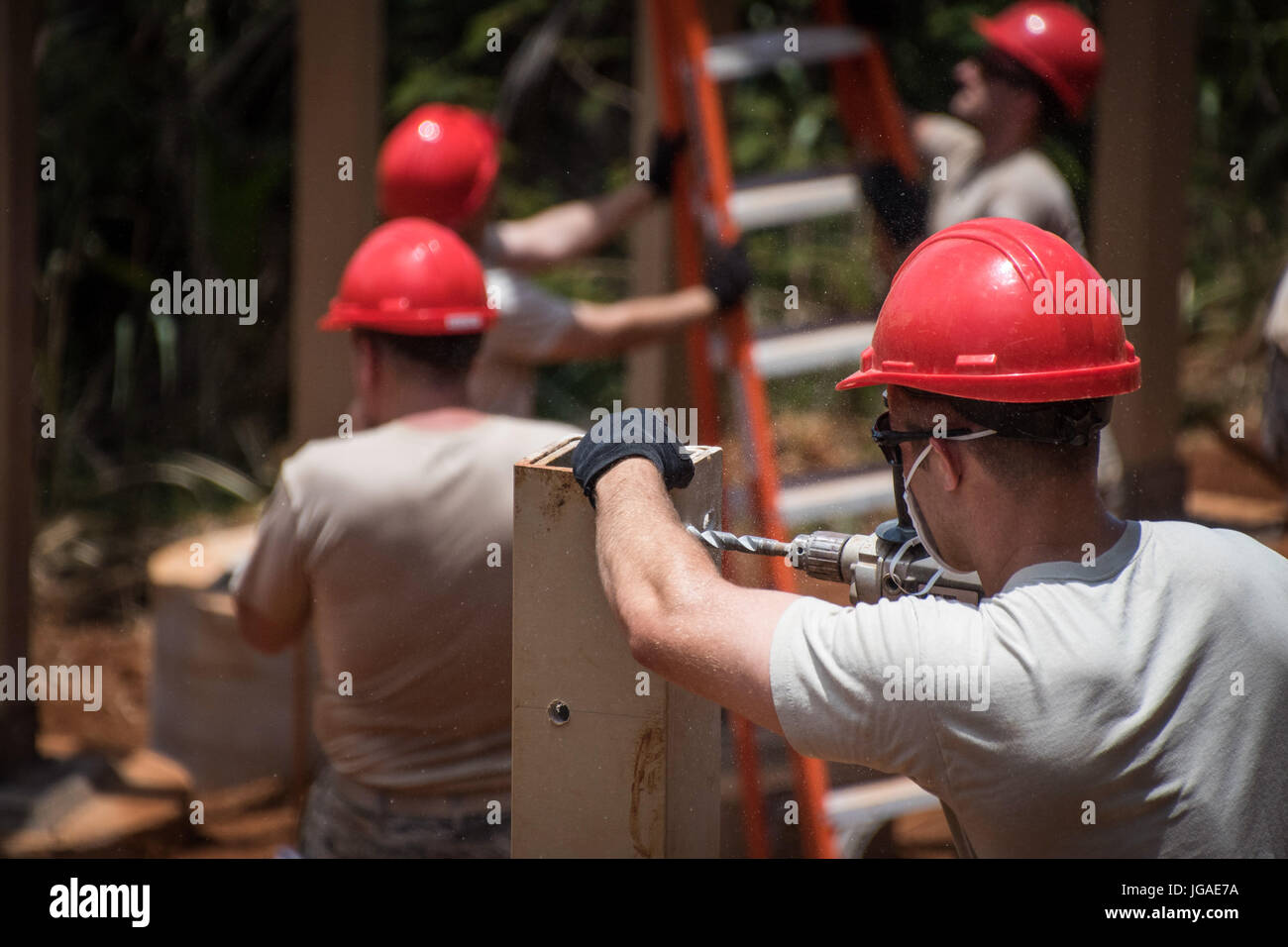 Staff Sgt. Adam Juhlke from the 200th RED HORSE Squadron (RHS) drills ...