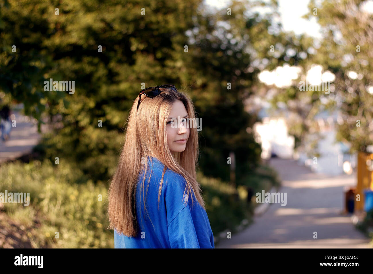 warm portrait of a young pretty girl with glasses Stock Photo - Alamy