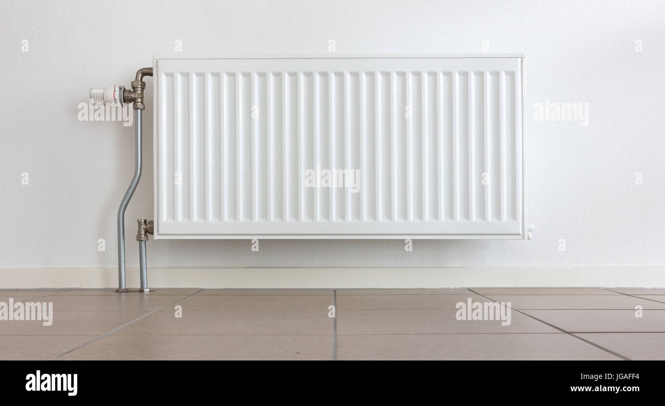 Heating radiator in a dutch home, selective focus Stock Photo - Alamy
