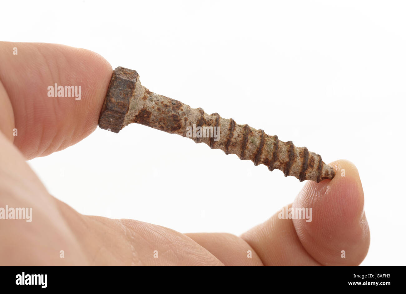 Rusted old screw isolated on white background Stock Photo - Alamy