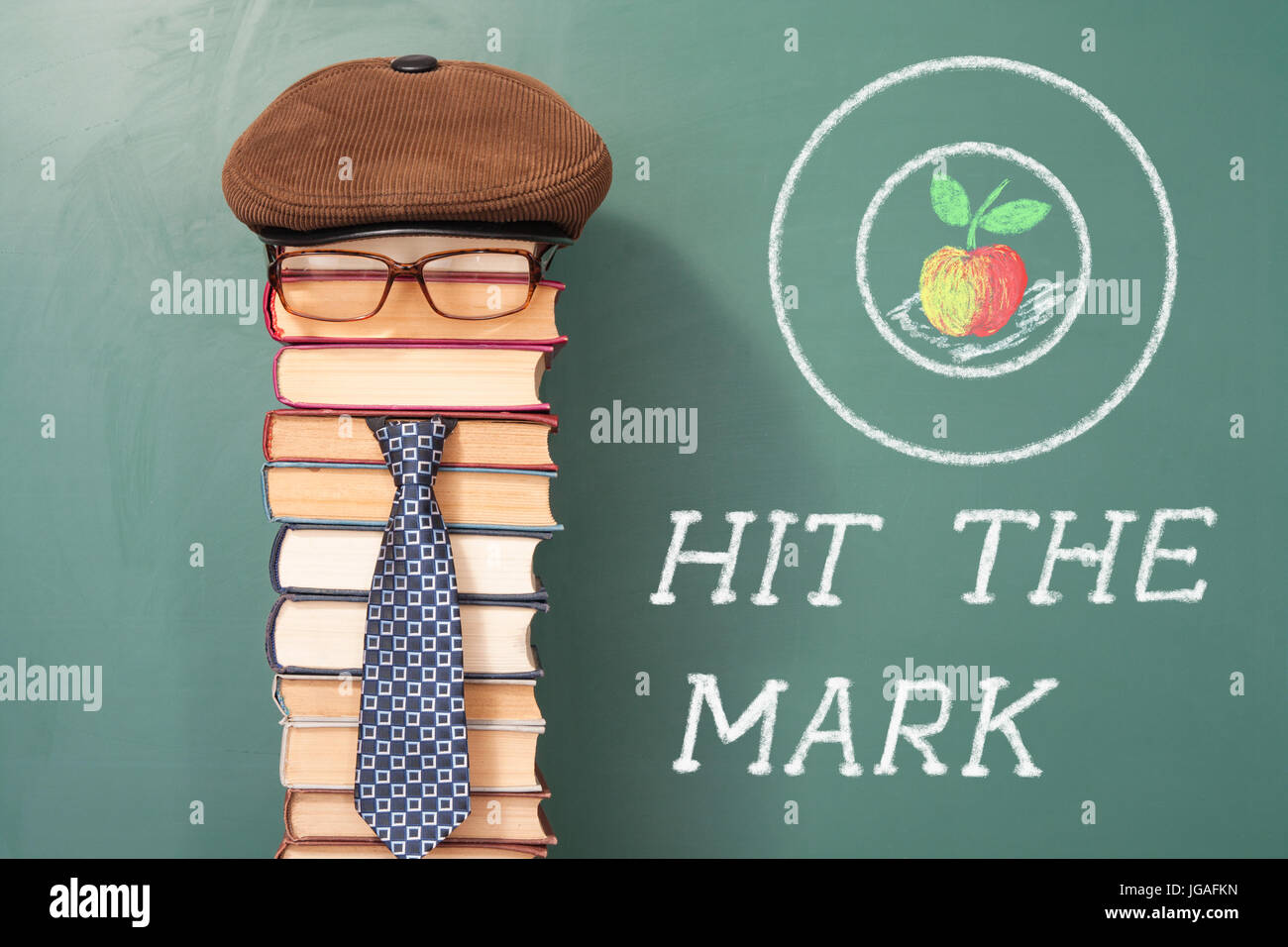Hit the mark, funny education concept Stock Photo - Alamy