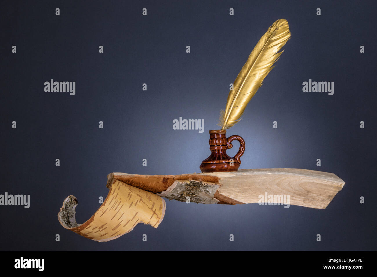 Education and literature concept. Abstract wood desktop with gold quill ...