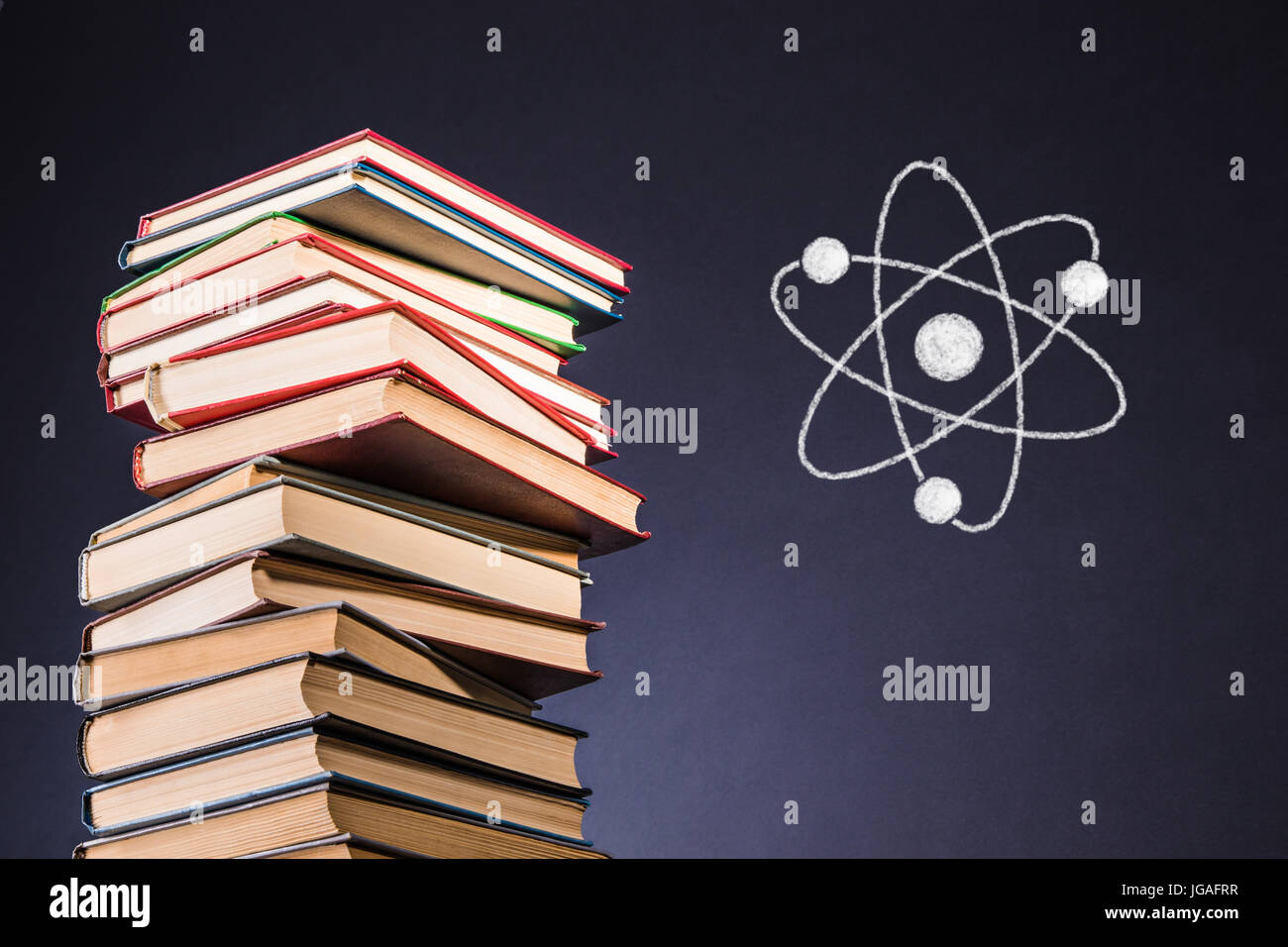 Stack of books isolated on gray background with science symbol Stock ...