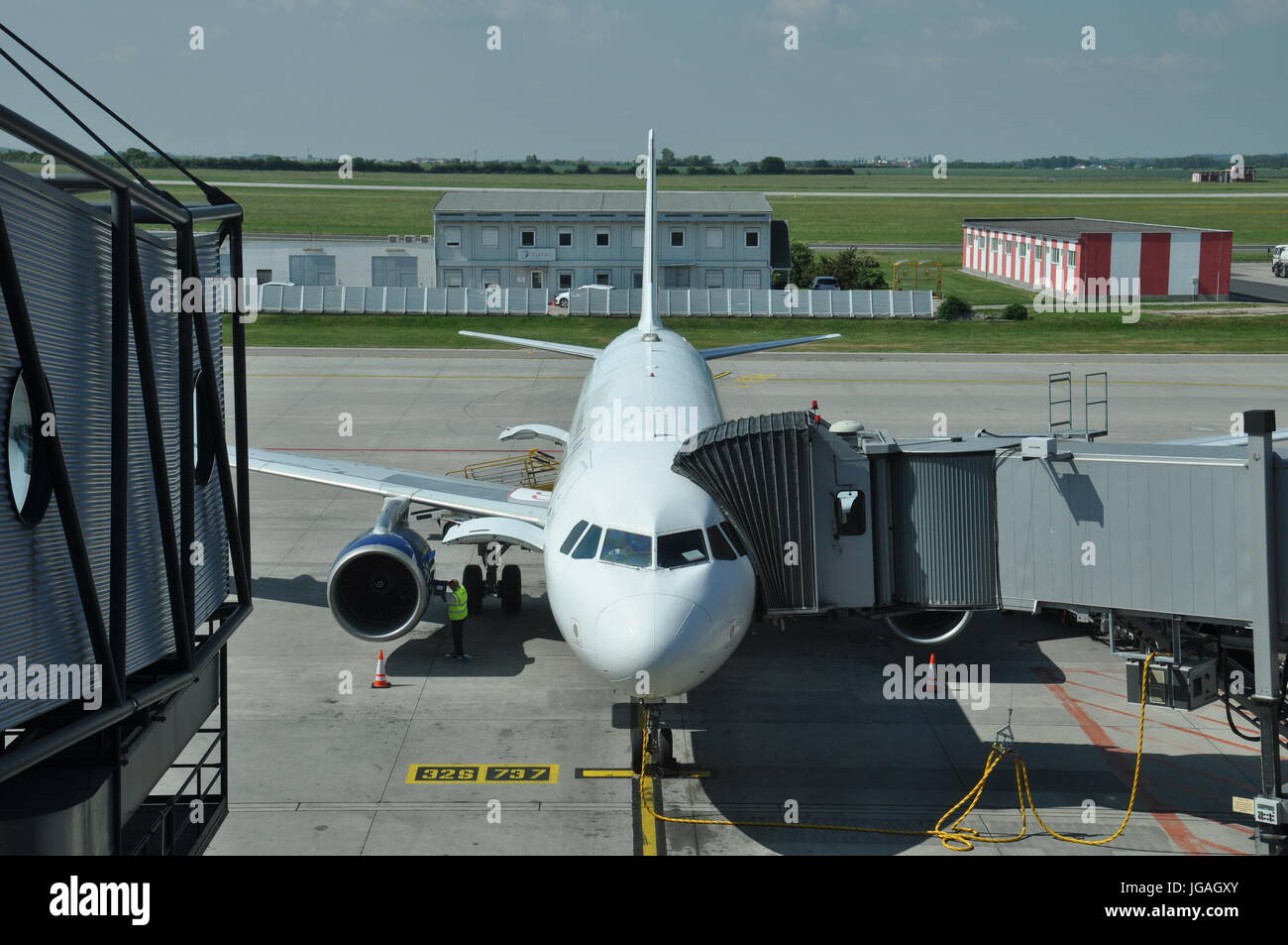 Getting into the plane, terminal, airport Stock Photo - Alamy