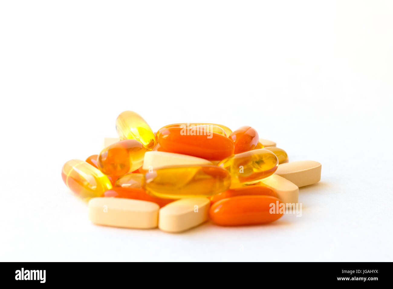 Vitamins and Healthy Supplements on white background Stock Photo - Alamy