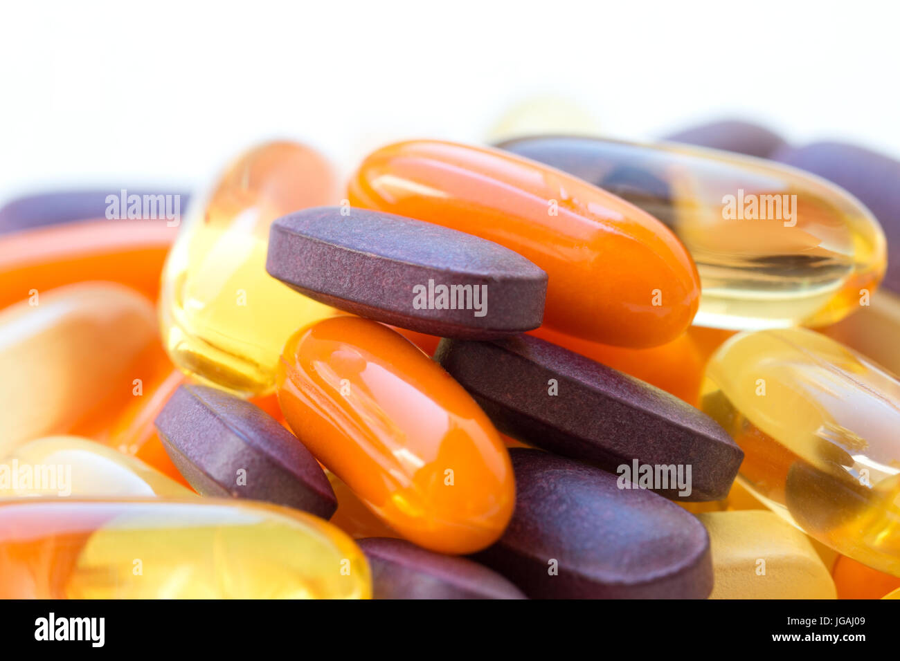 Vitamins and Healthy Supplements on white background Stock Photo - Alamy