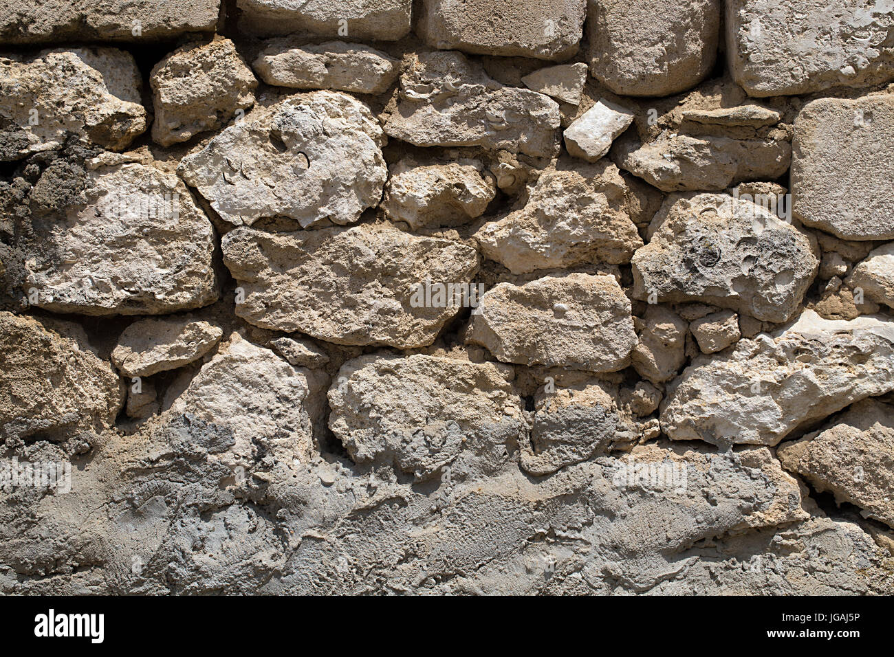 Shell rock wall. Fragment of old rustic cobblestone wall surface Stock ...