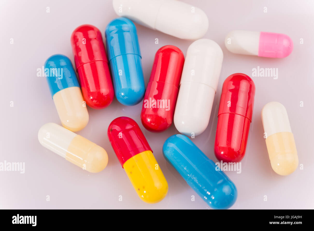 different Tablets pills capsule heap mix therapy drugs Stock Photo - Alamy