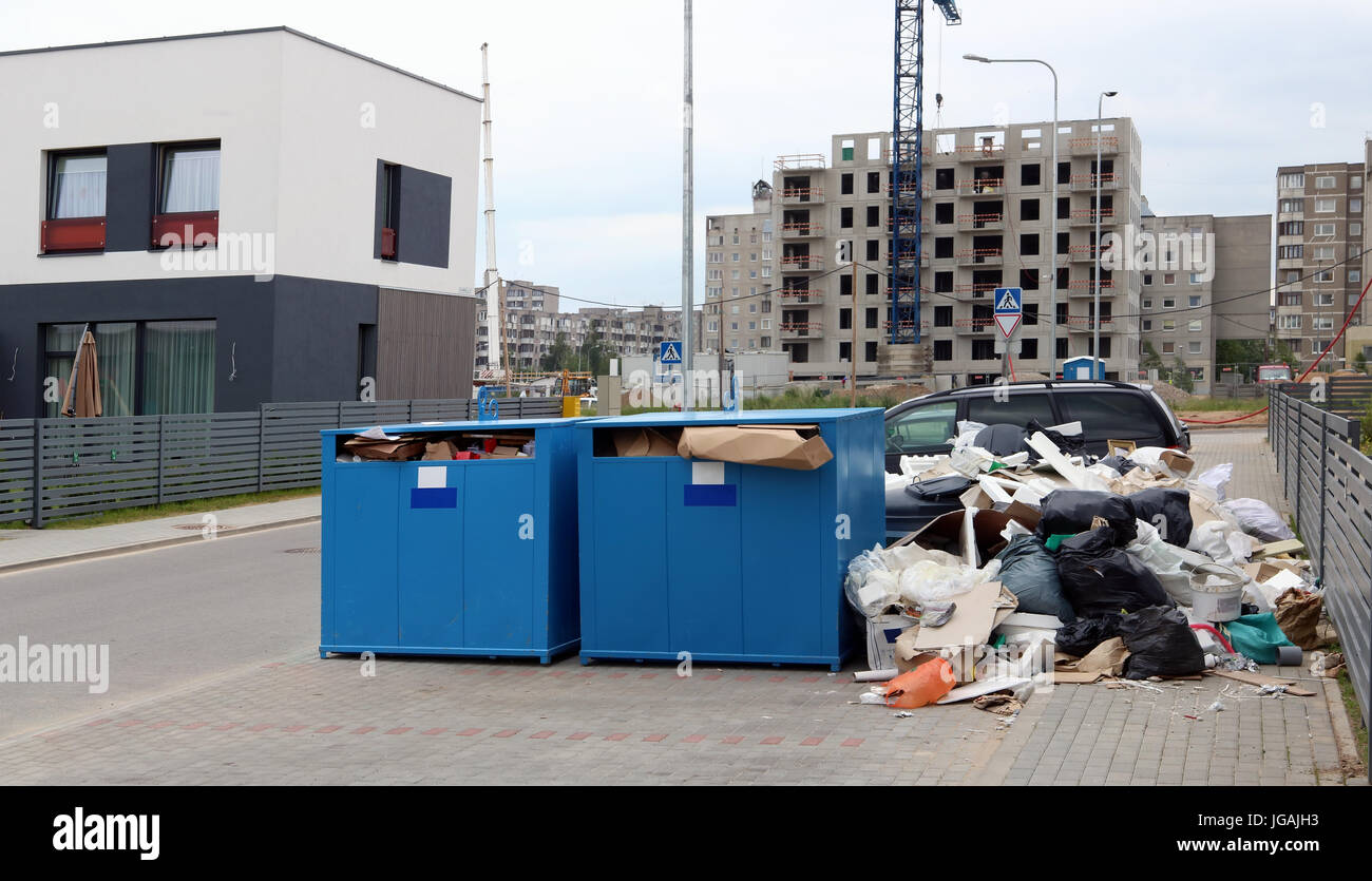 The overflowed garbage containers and tanks near the area of ...