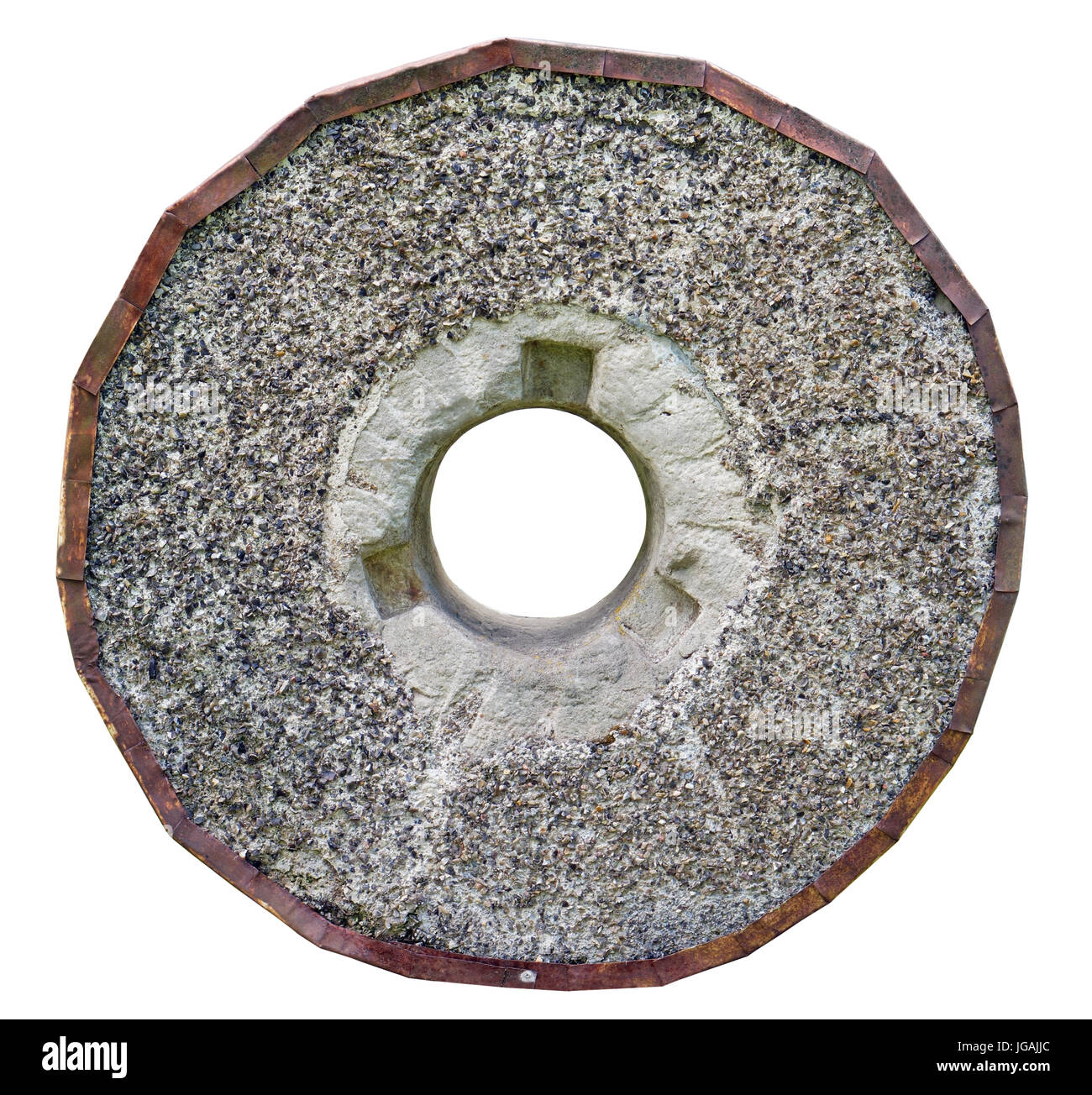 Stone granite wind will wheel with rusted metal rim isolated on white ...