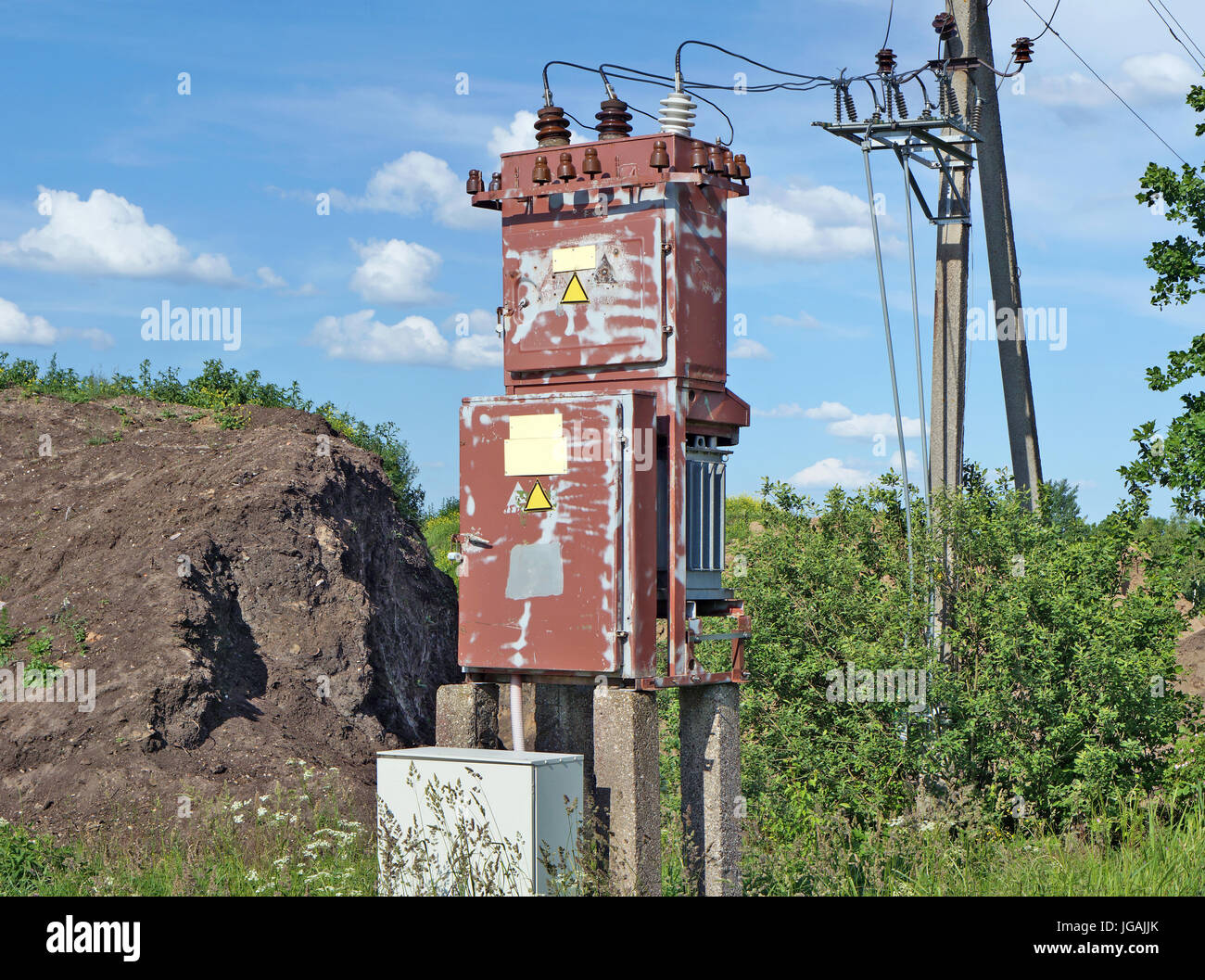 The old destroyed rural electric distributive transformer in forest ...