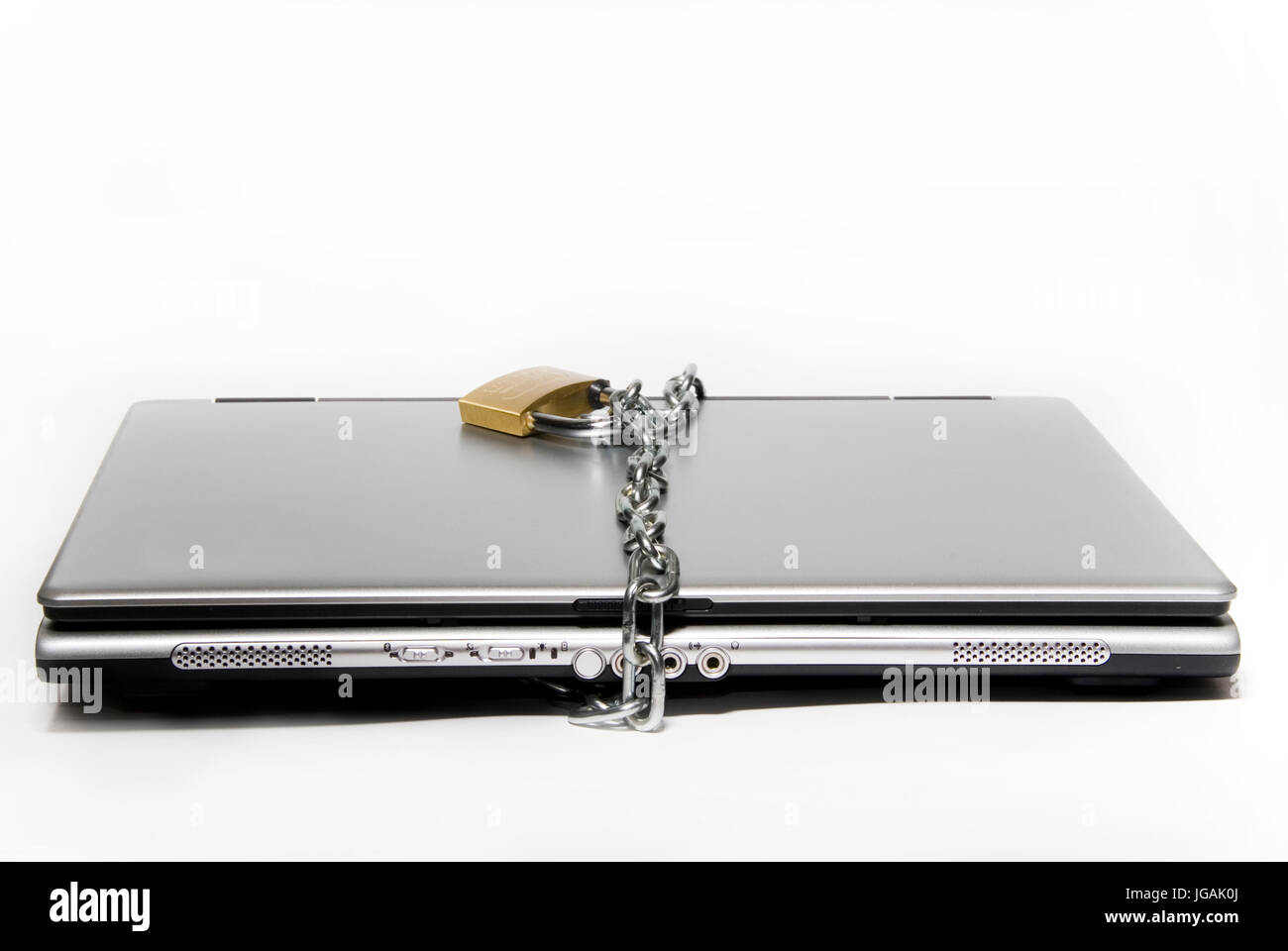 laptop computer with lock and chain around it Stock Photo - Alamy