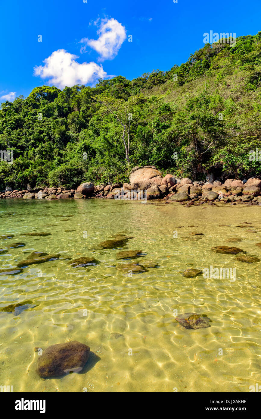 Deserted and unspoilt beach with its limpid, green and transparent ...