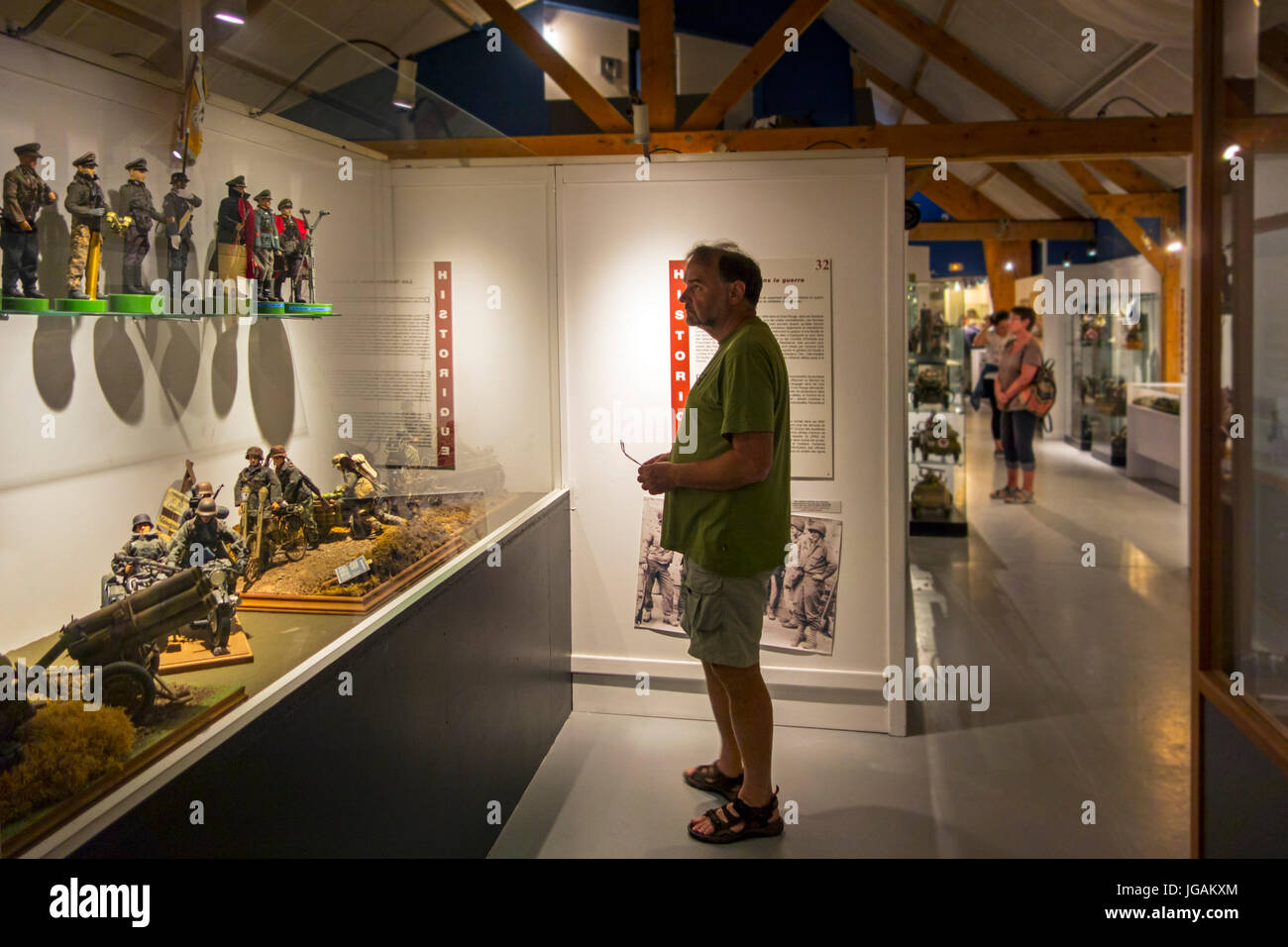 Visitor looking at scale model soldiers in the Memorial World War II ...