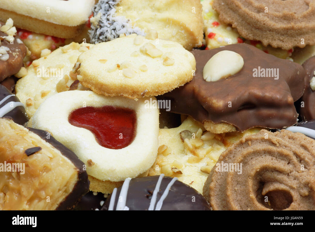 Colorful cookies as background. Shot in studio Stock Photo - Alamy