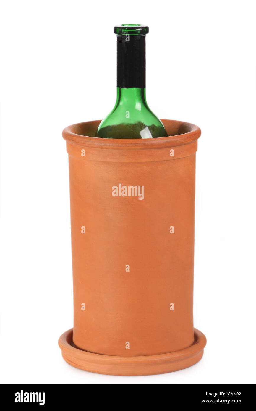 Opened green wine bottle in traditional terracotta wine cooler Stock ...