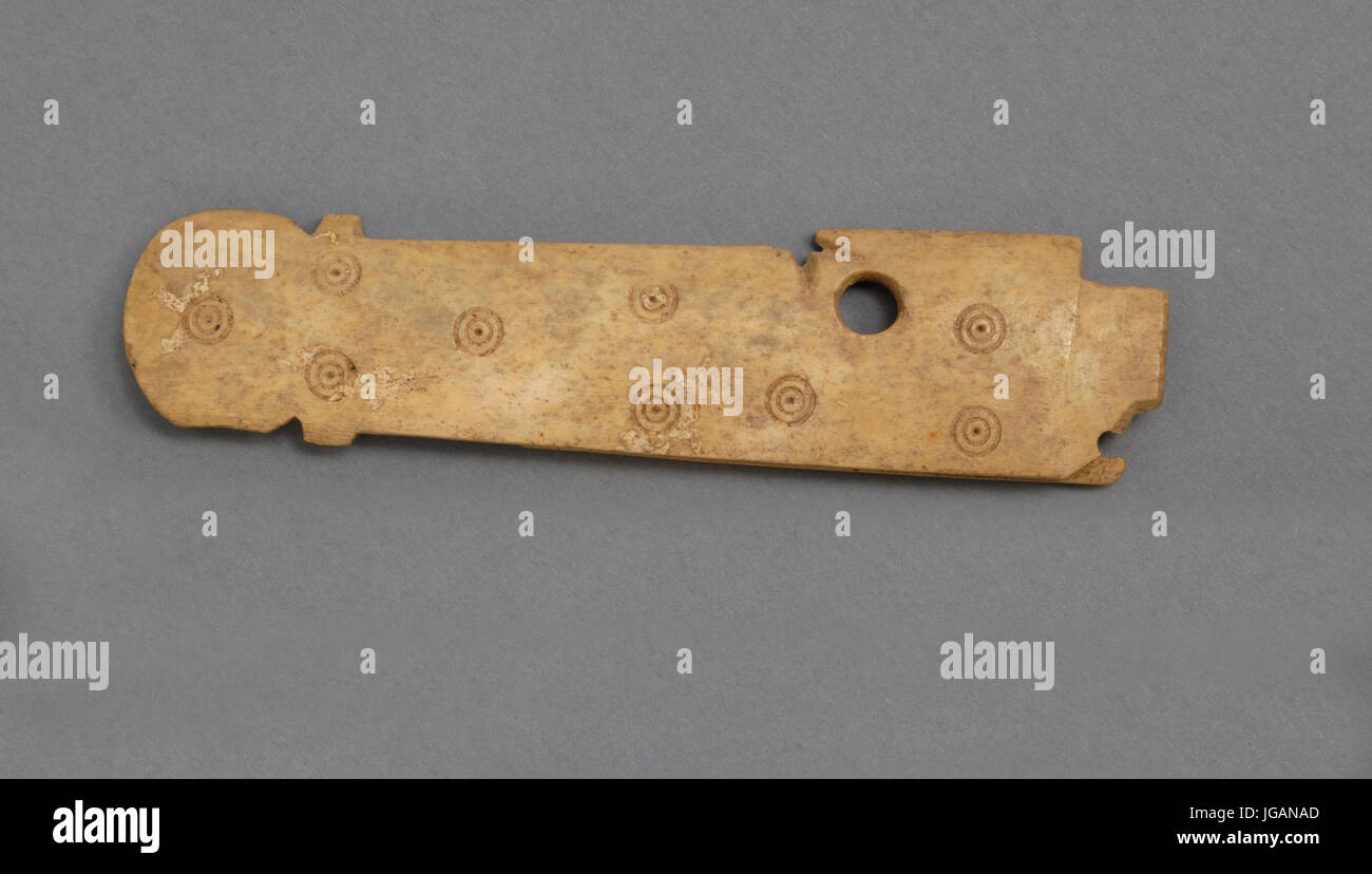 Decorated bone from excavation, Greek, Roman Stock Photo - Alamy