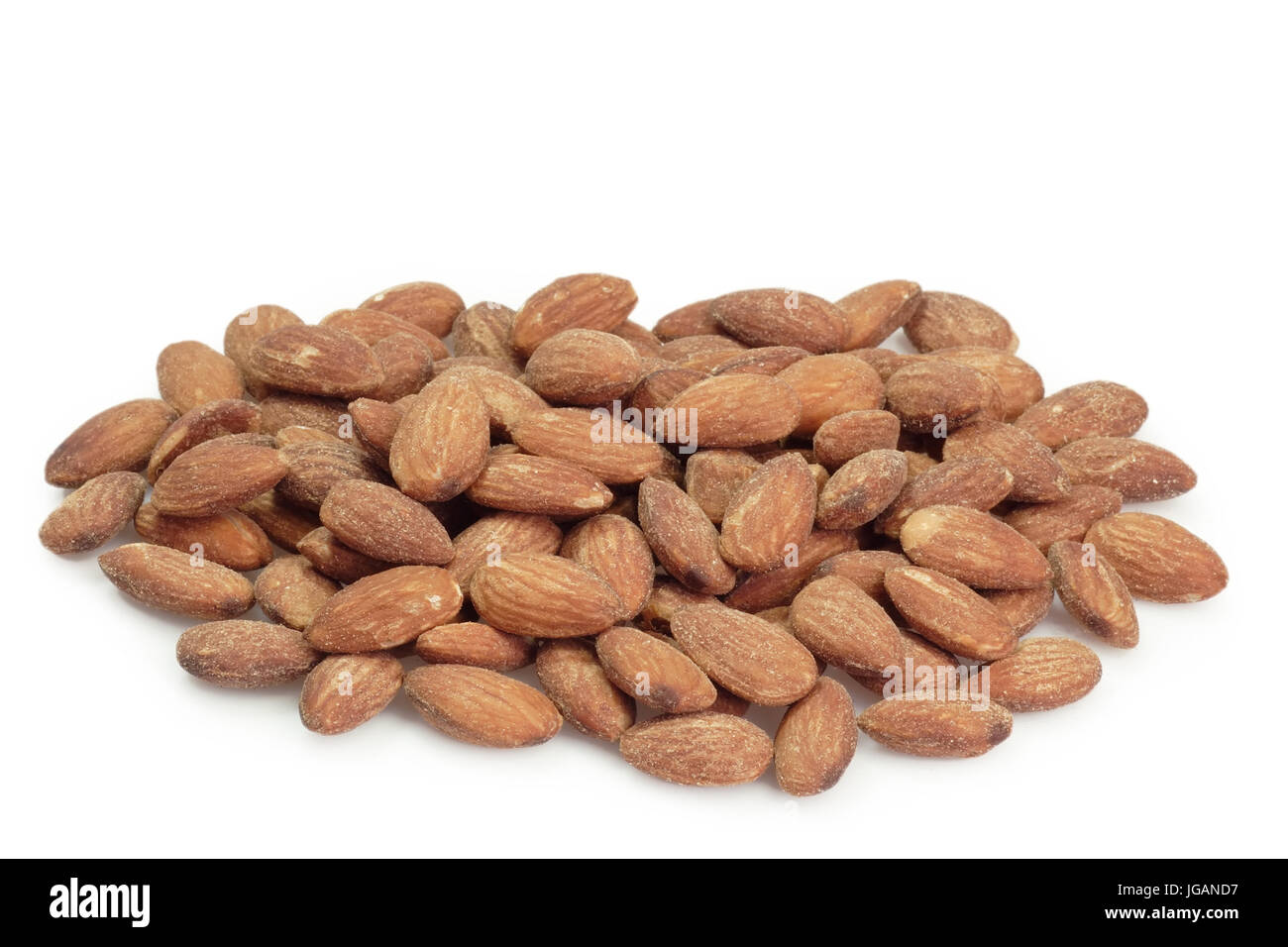 Almonds on the bright background Stock Photo - Alamy