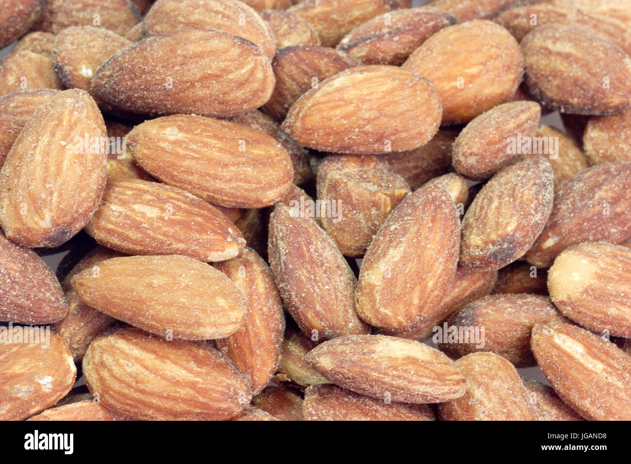 Almonds as background. Shot in studio Stock Photo - Alamy