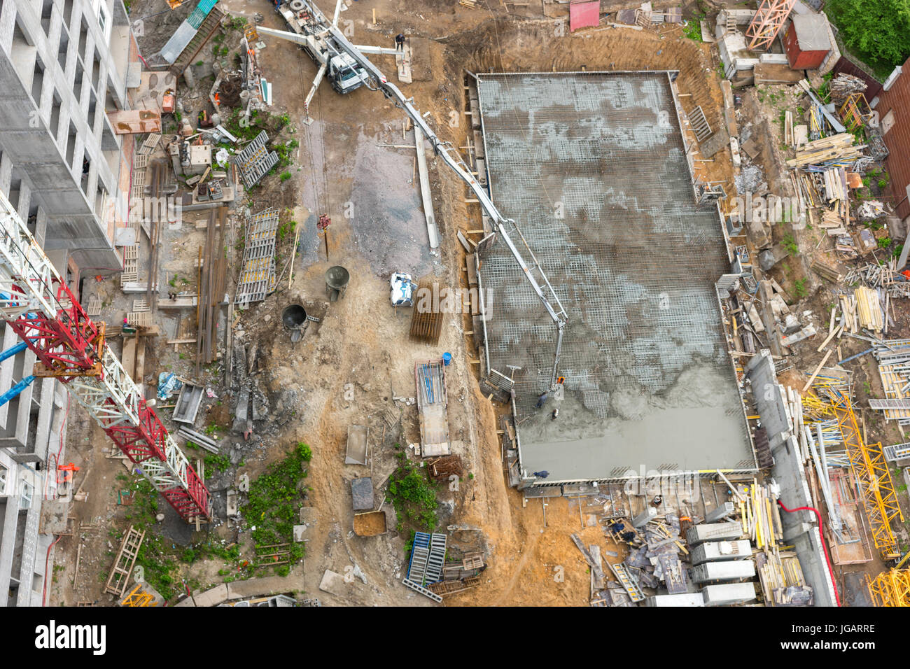 Top view of construction site with cranes in business industrial ...