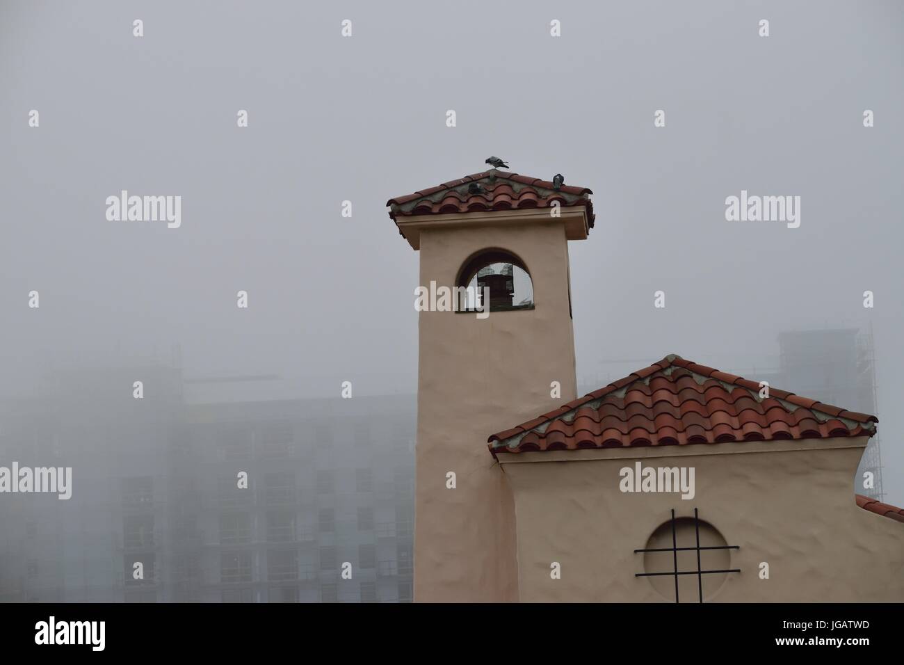 Marina Layer covers a historic California building Stock Photo - Alamy
