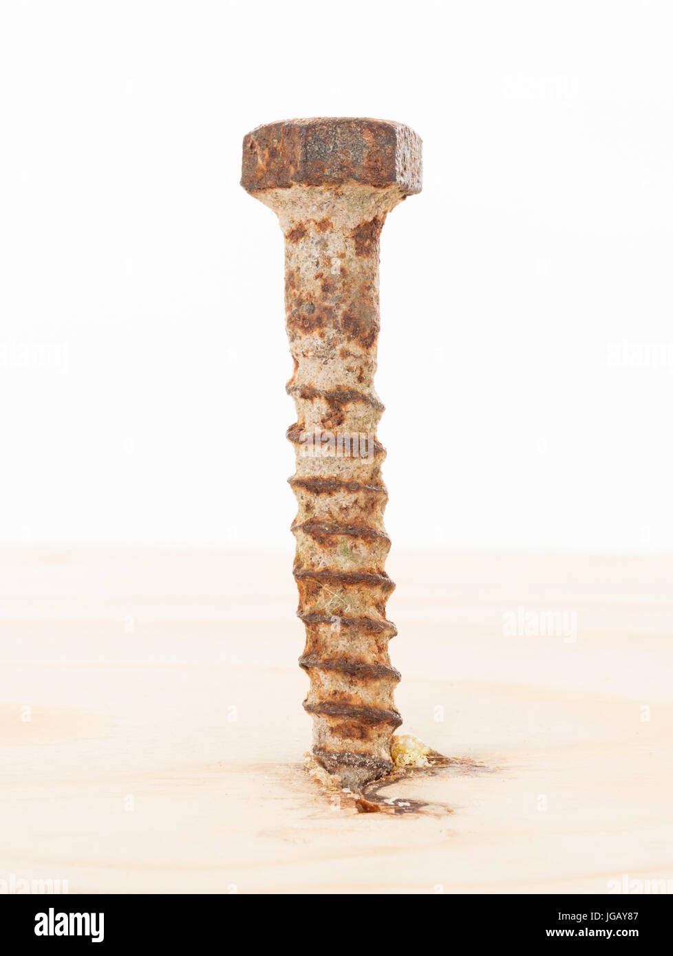 Rusted old screw isolated on white background Stock Photo - Alamy