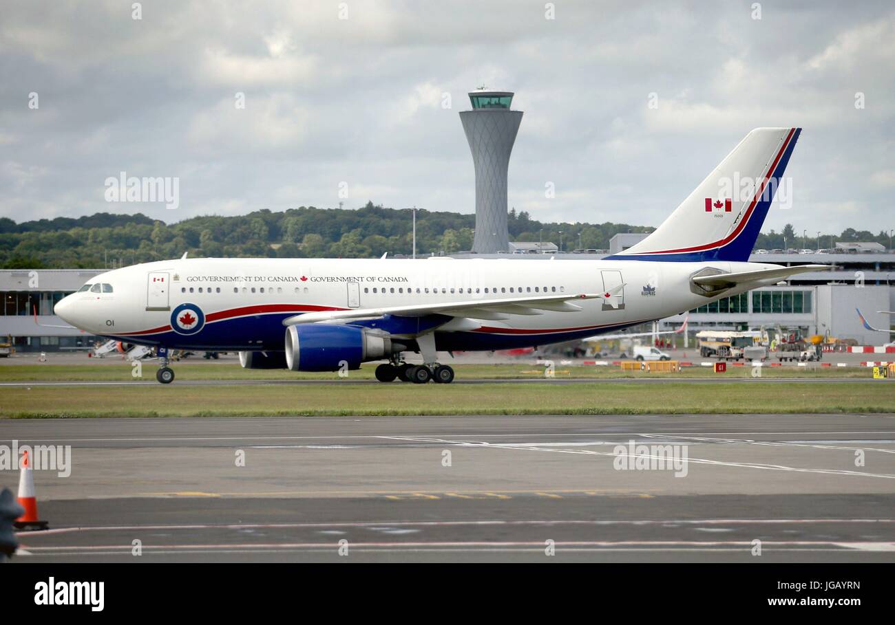 A plane carrying Canadian Prime Minister Justin Trudeau lands at ...