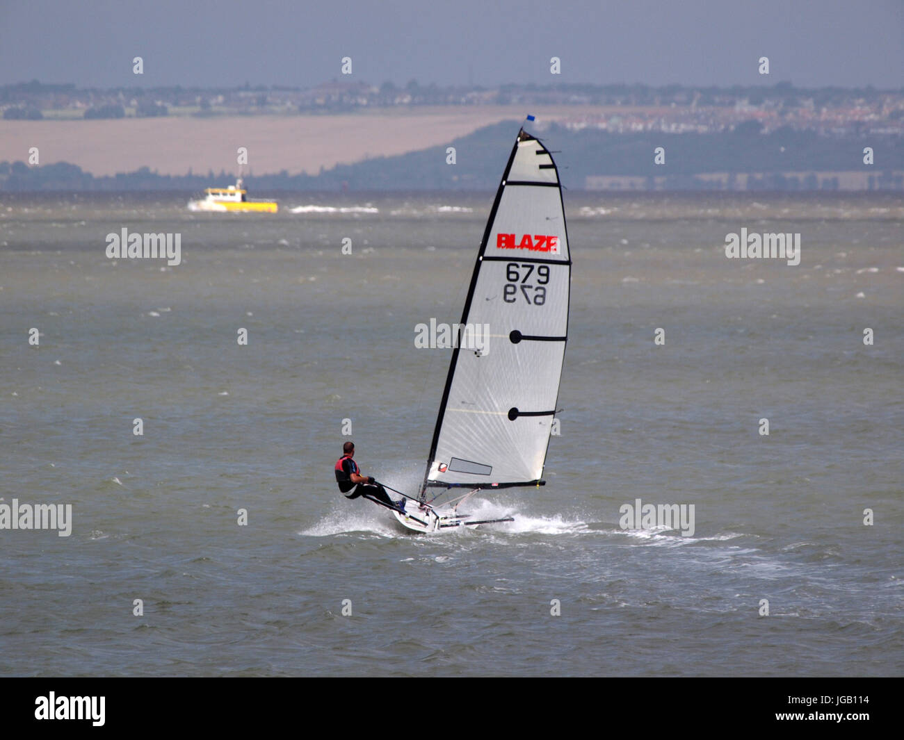 A Blaze racing dinghy at speed Stock Photo - Alamy