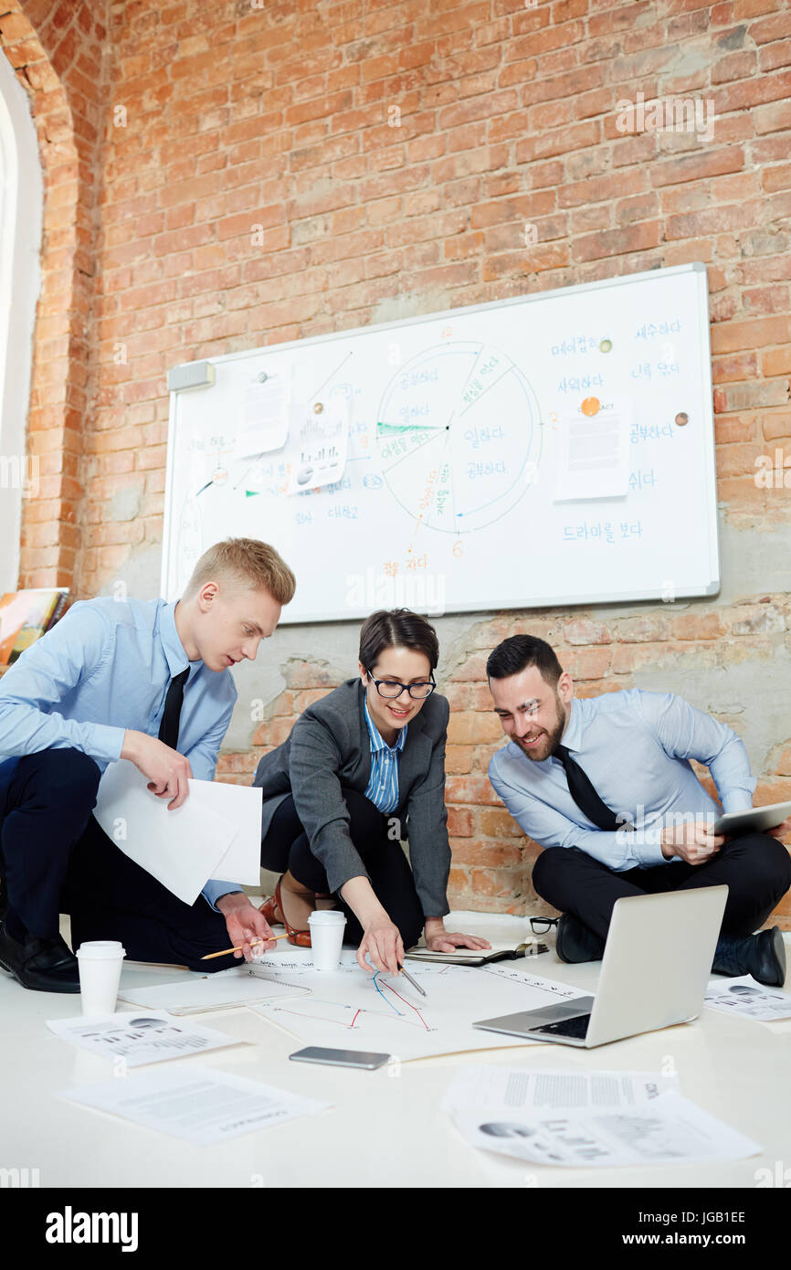 Working with papers Stock Photo - Alamy